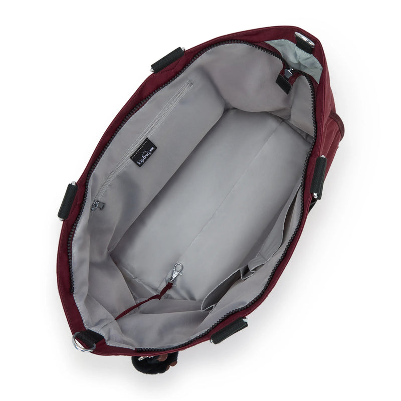 Kipling Live. A colorful array of handbags, backpacks and much more